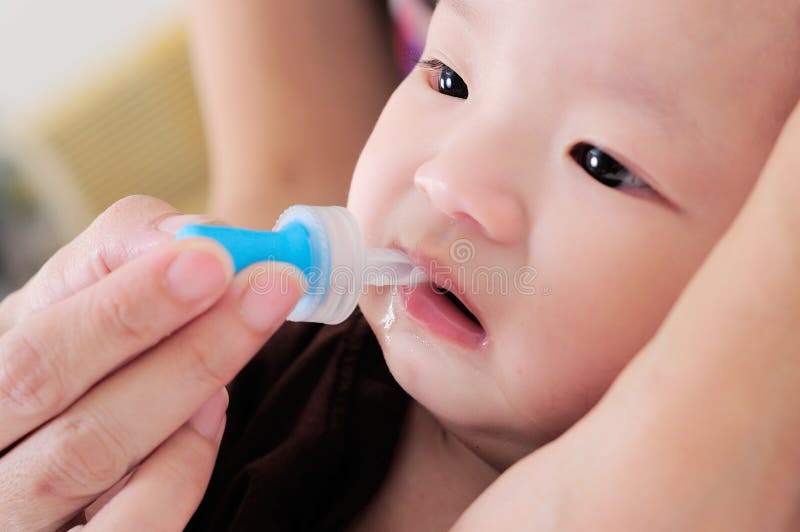 Baby Taking Medicine with Dropper Stock Image - Image of patient, baby ...