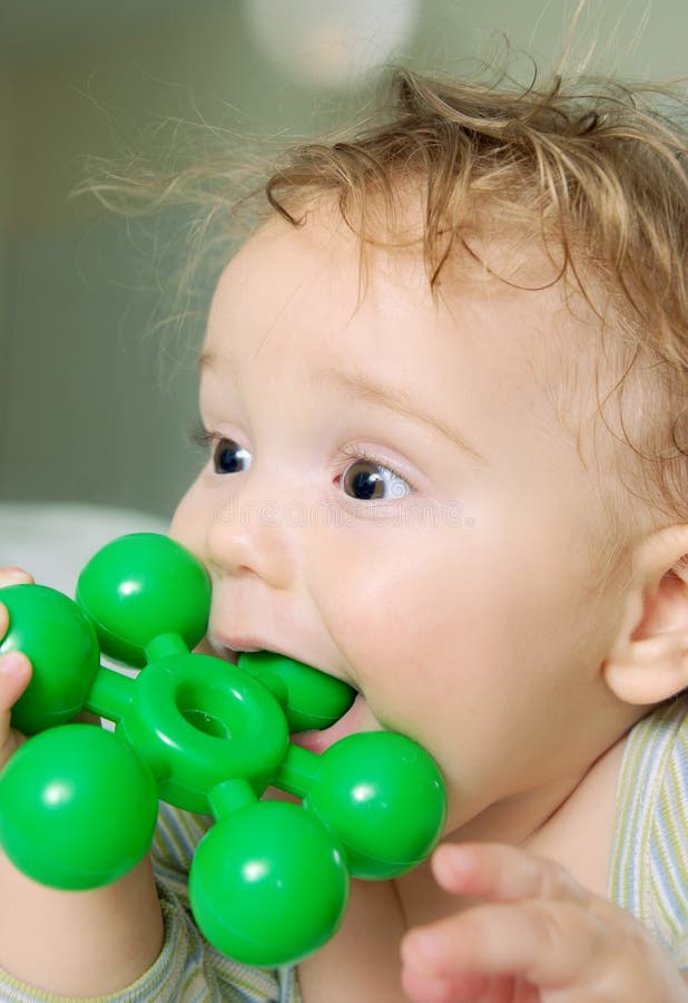 Baby teething stock image. Image of green, healthy, innocence - 4368049