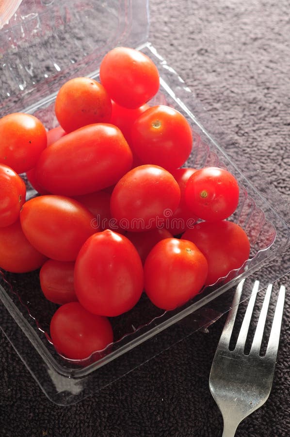 Baby tomato stock image. Image of bowl, fork, small, baby - 49945199