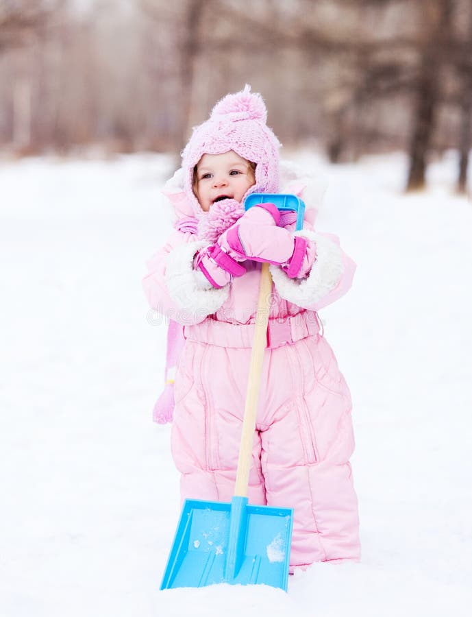 Baby with a toy spade stock image. Image of people, childhood - 22309729