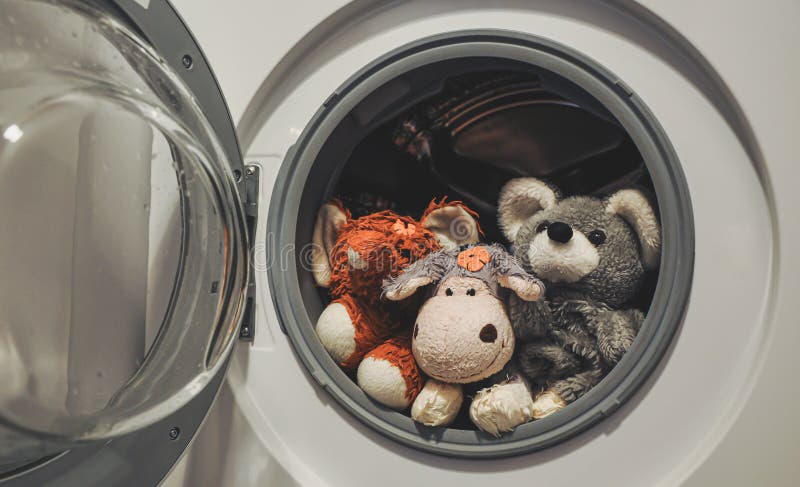 Baby Toys in the Washing Machine. Plush, Fluffy Toys after Washing ...