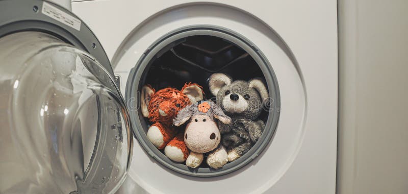 Baby Toys in the Washing Machine. Plush, Fluffy Toys after Washing ...