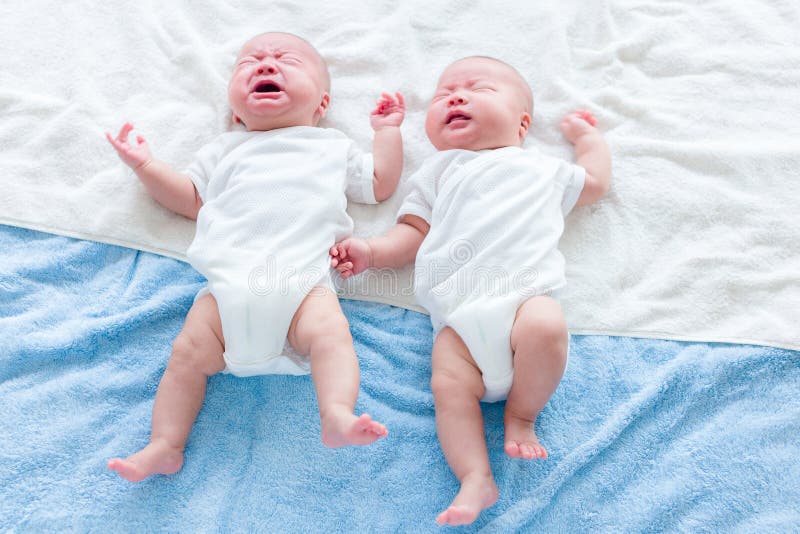 Baby Twins, One Crying and One Quiet Stock Photo - Image of child ...