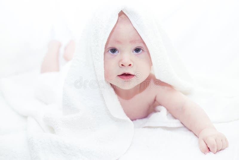 Baby under a white towel stock photo. Image of innocence - 65321720