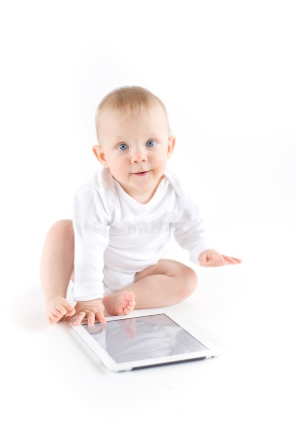 Baby using digital tablet stock image. Image of behavior - 28863655