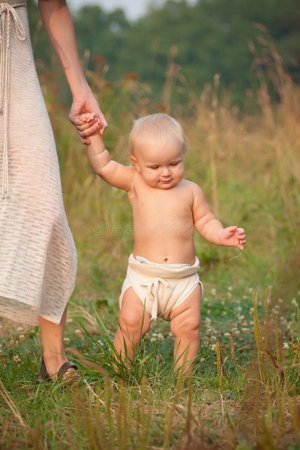 Baby walking stock image. Image of affectionate, attractive - 16964519
