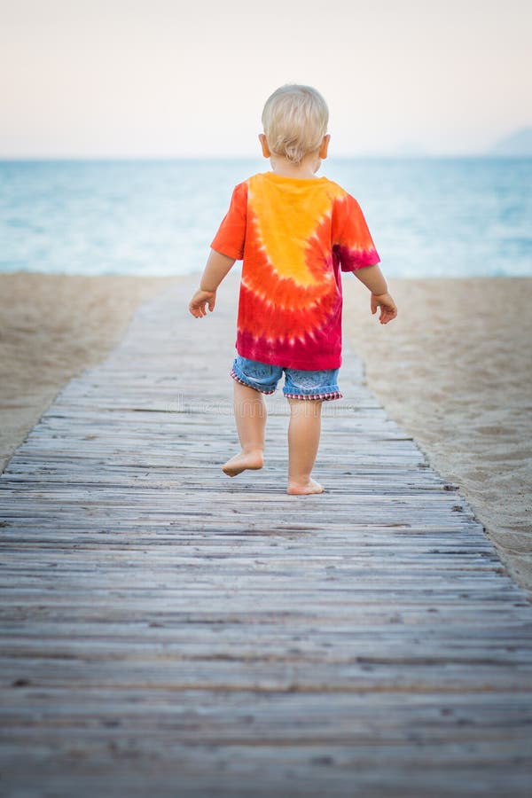 Baby walking stock photo. Image of learning, baby, back - 50658082