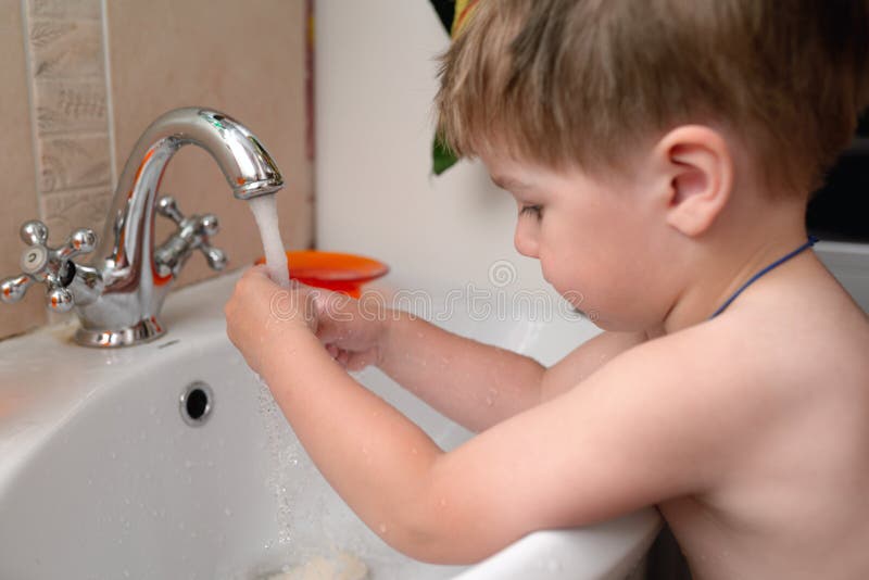 Baby Washing Hand in Bathroom Stock Photo - Image of brunette, natural ...