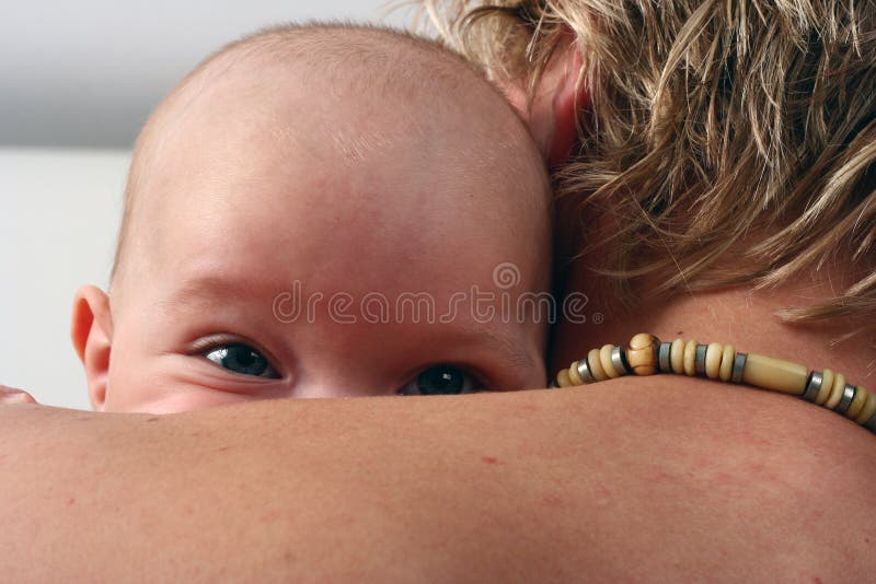 Baby Watching Over Shoulder Stock Photo - Image of adorable, affection ...