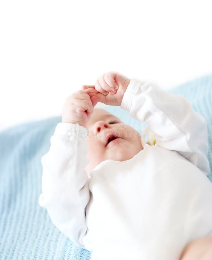 Baby Watching at Own Fingers Stock Image - Image of infant, background ...
