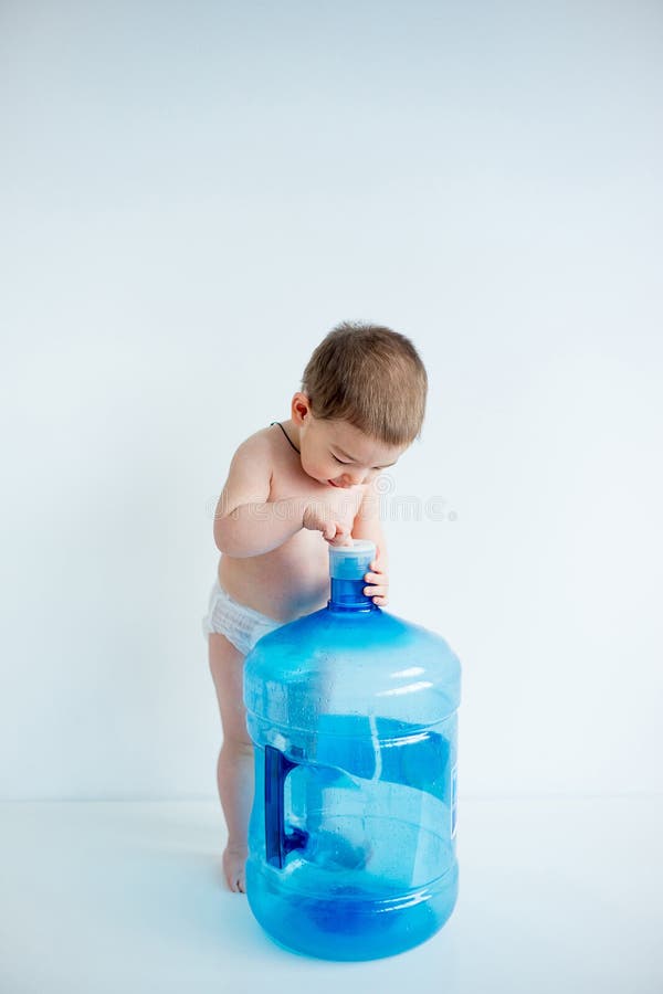 Baby with a water bottle stock photo. Image of beverage - 106697438