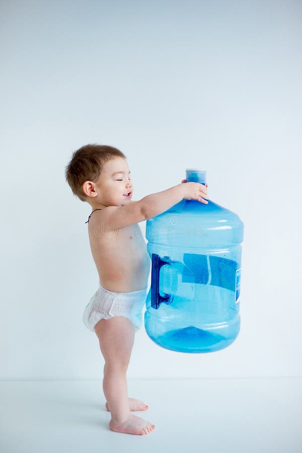 Baby with a water bottle stock photo. Image of person - 106697360