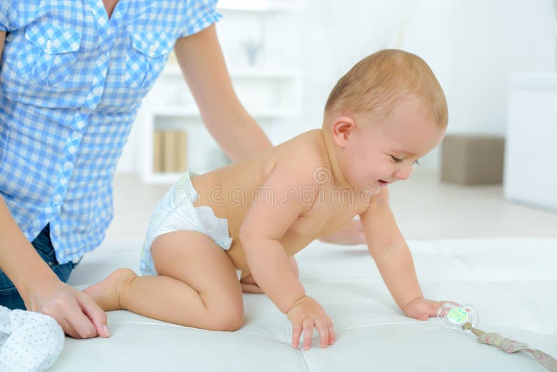 Baby wearing diaper stock image. Image of craw, innocent - 158694841