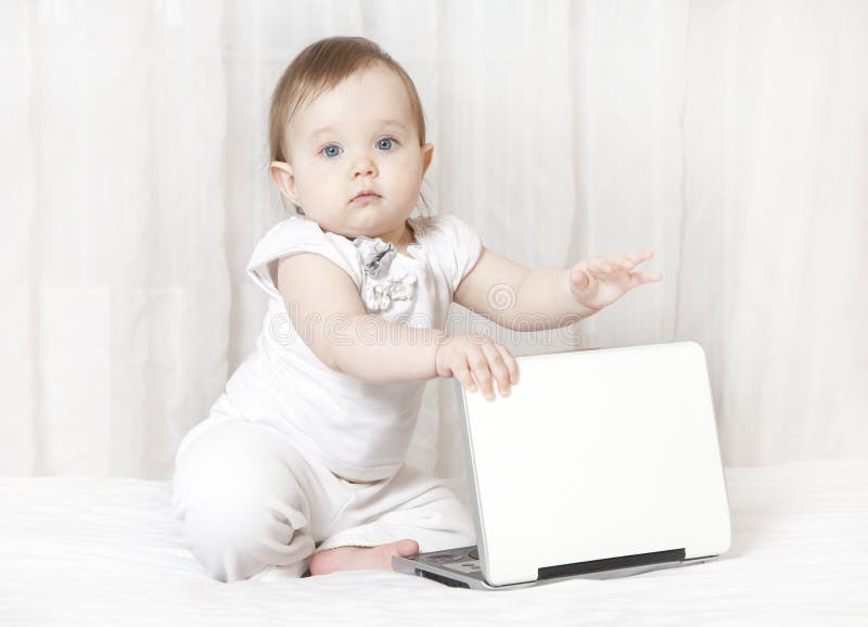 Baby with a laptop stock photo. Image of girl, education - 18608696