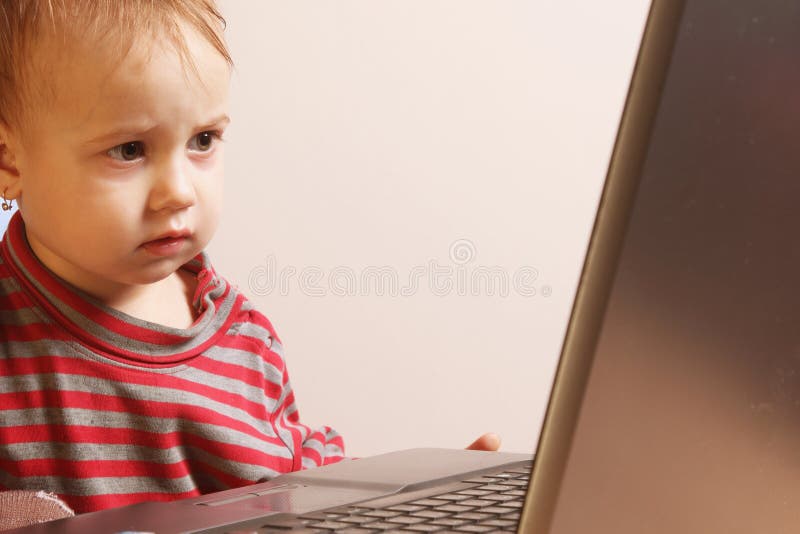 Baby is Working with a Laptop (humorous Photo) Stock Photo - Image of ...