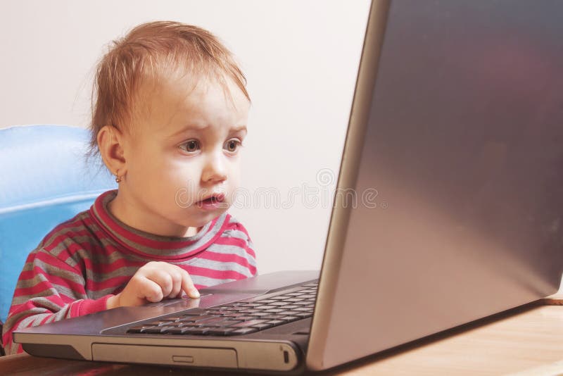 Baby is Working with a Laptop Humorous Photo Stock Photo - Image of ...