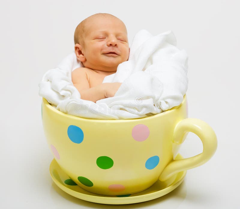 Baby in a tea cup stock image. Image of happy, beauty - 18612539
