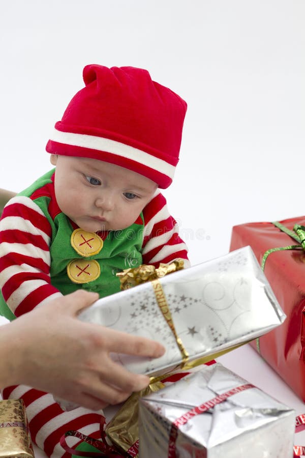 Babys First Present stock image. Image of december, christmas - 16840687