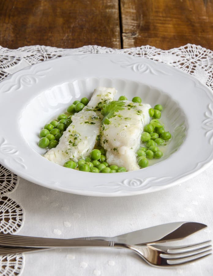 Bacalao al pil pil stock photo. Image of baked, tomatoes - 259029148