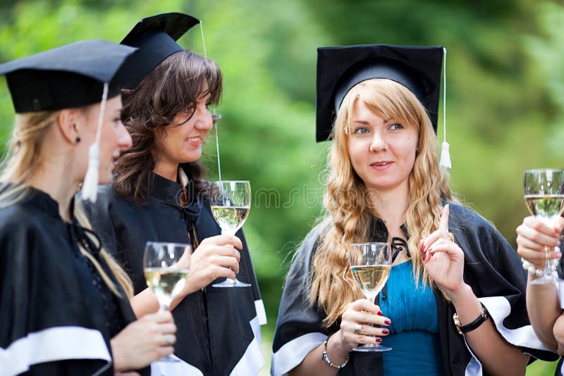 Bachelor Graduates Celebrate Stock Photo - Image of learning, adult ...