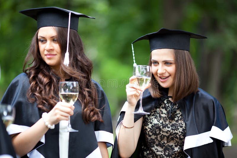 Bachelor Graduates Celebrate Stock Image - Image of happiness, outdoors ...