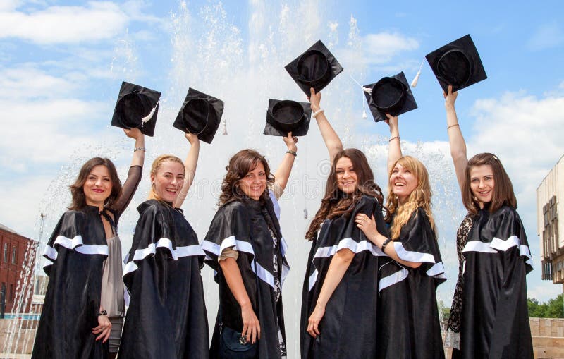 Bachelor Graduates Celebrate Stock Image - Image of group, beautiful ...