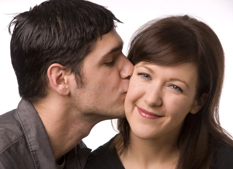 Bacio sulla guancica immagine stock. Immagine di caucasico - 12643425