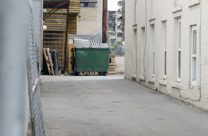 Back Alleyway in a City with a Garbage Dumpster Stock Image - Image of ...