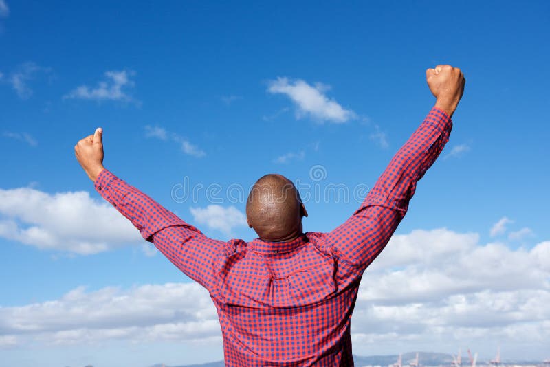 Back of Black Man with Raised Hands in the Air Stock Photo - Image of ...