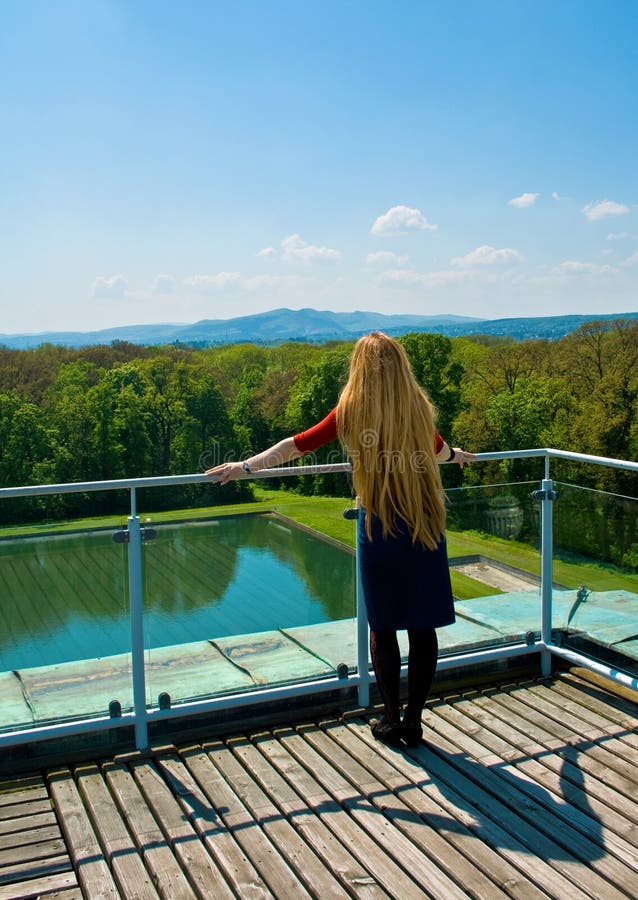 Back Of Blond Woman Contemplating High View Picture. Image: 5154879