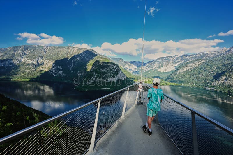 Back of Boy at Observation Bridge in Hallstatt, Austria Stock Photo ...