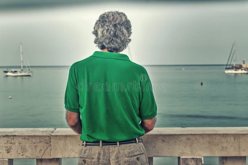 Back of Charming Man Relaxing in a Seaside Town Stock Photo - Image of ...