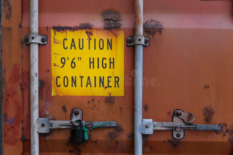 The Back Door of an Aged and Rusty Heavy-duty Red Container with Locks ...