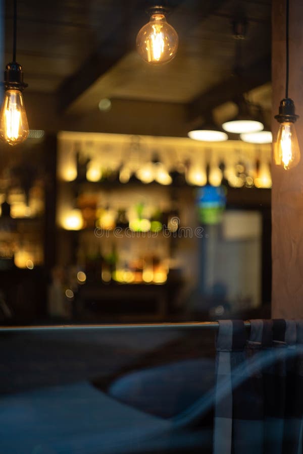 The Back Door of a Restaurant with a Group of Lights on Stock Image ...
