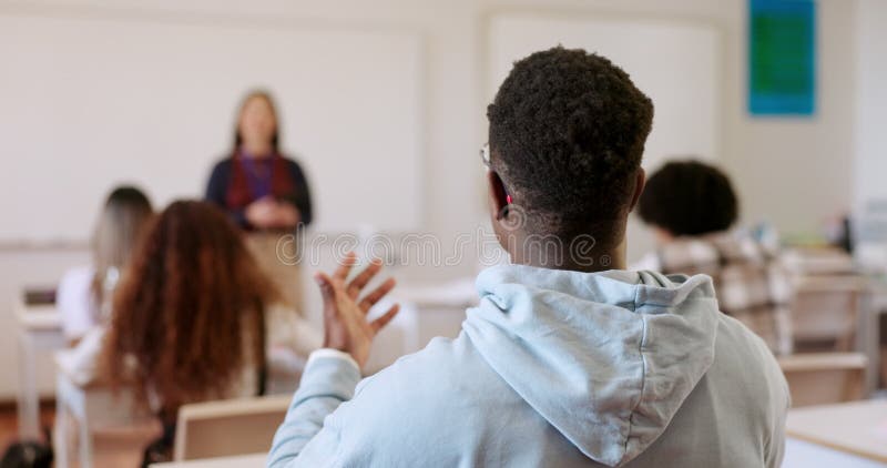 Back, Education and a Student Talking in a Classroom, Asking His ...