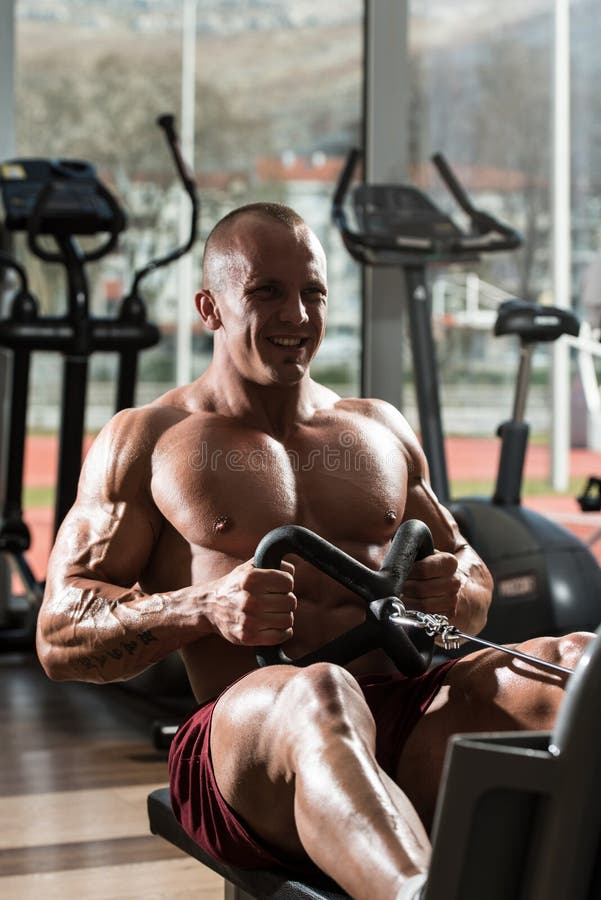 Back Exercises on a Seated Row Machine Stock Image - Image of muscles ...