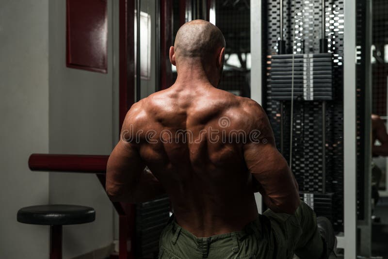 Back Exercises on a Seated Row Machine Stock Image - Image of building ...