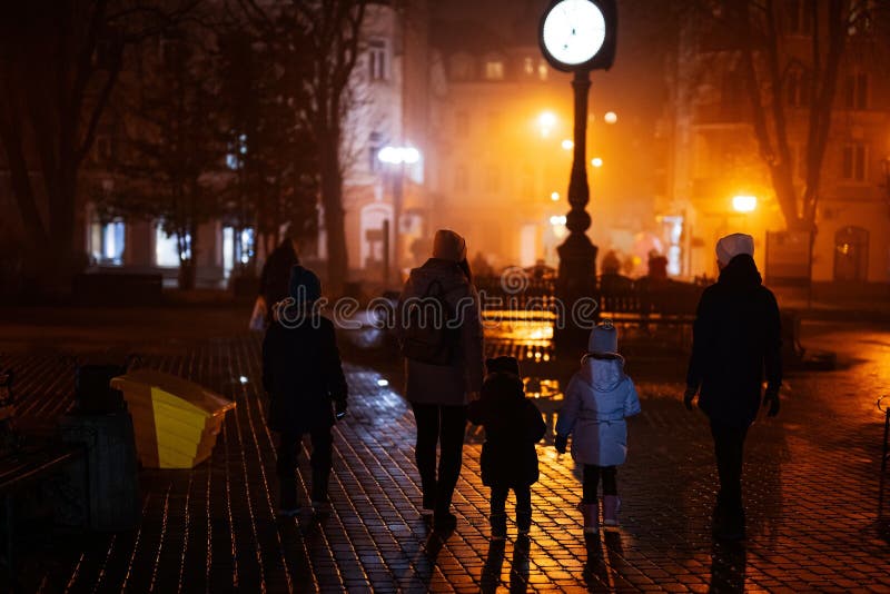 Back of Family Walking in Night City Stock Image - Image of city, cold ...