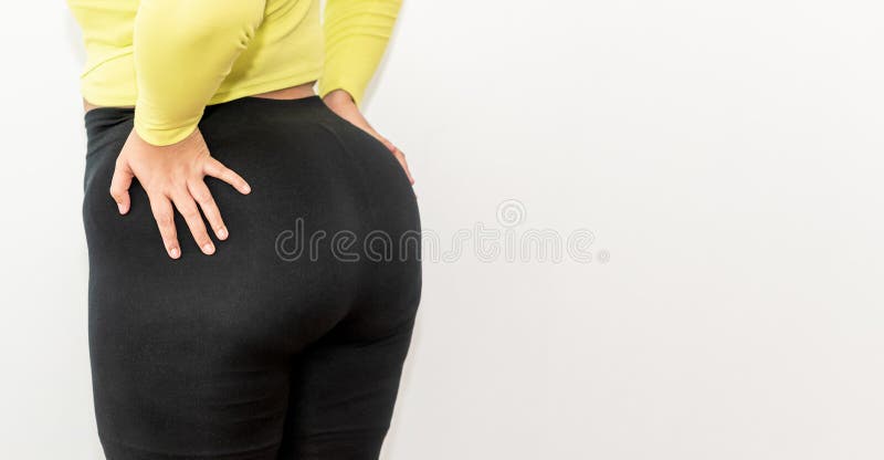The Back Of A Fat Woman Using Hands To Pinch On The Hips Which Is Large
