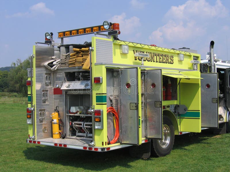 Back Of The Fire Engine stock photo. Image of extinguisher - 1303248