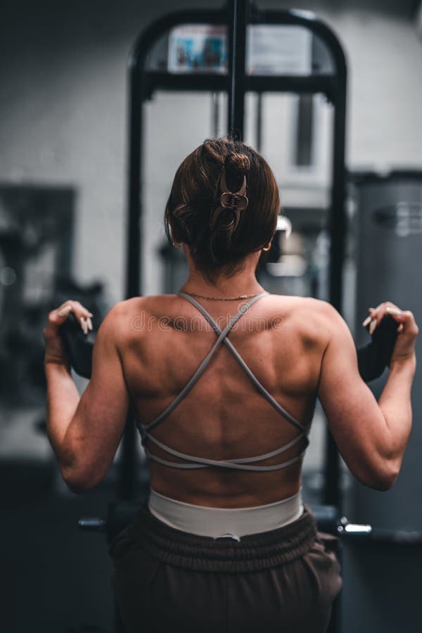 Back of the Girl Working Out in the Gym. Stock Photo - Image of woman ...