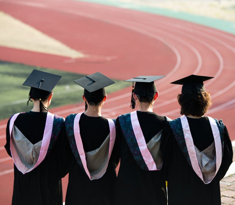 Graduates in university stock image. Image of knowledge - 98007383