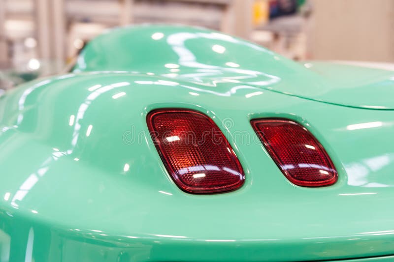Back of a Green Modern Sport Car Stock Image - Image of halogen, stop ...