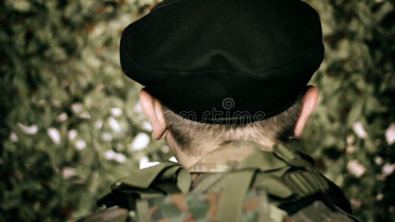Back of the Head of a Soldier in Front of Camouflage Net Stock Video ...