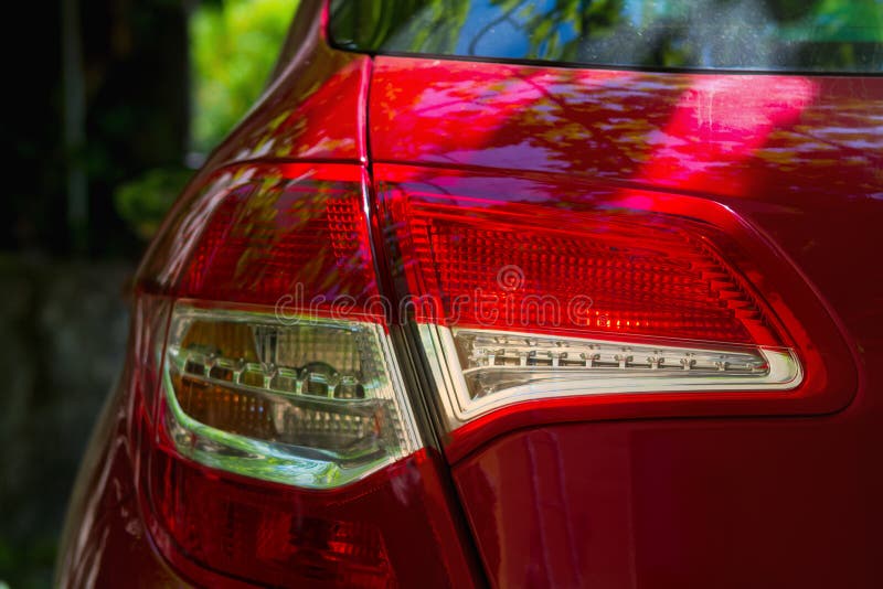 Back Headlight with Parking Lights on a Red Car, Close Up Stock Image ...