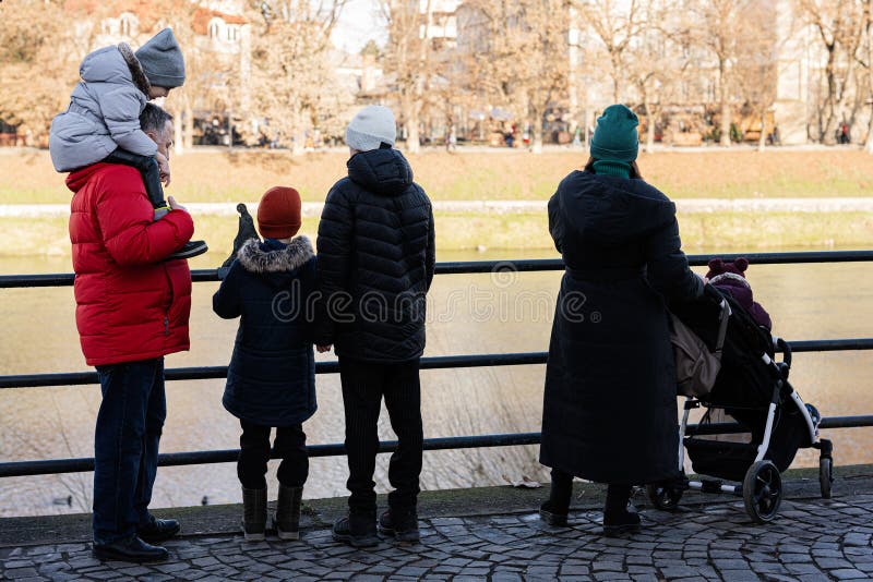 Back of Large Family Against River Stock Photo - Image of male ...