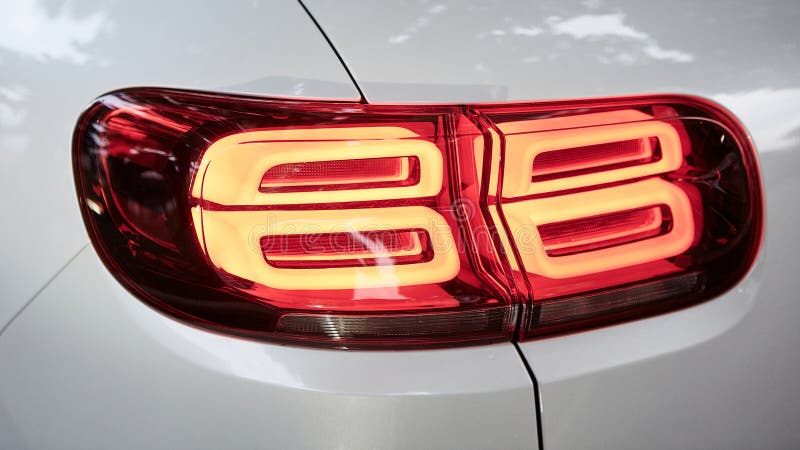Back Lights of White Car. while Flaming Red Stock Image - Image of ...