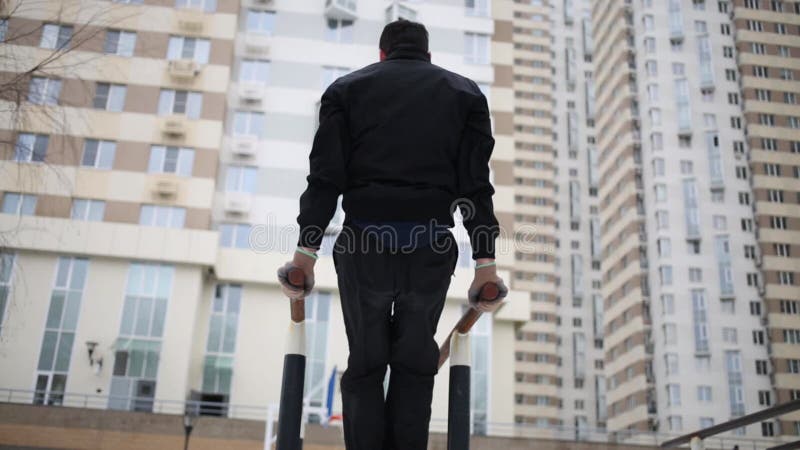 Back of Man in Black Swing Legs Forward and Stock Footage - Video of ...