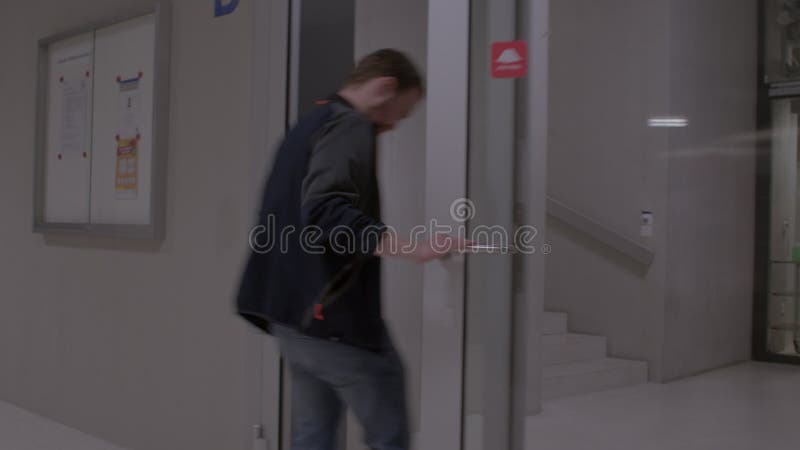 Back Man Exits Elevator, Takes Steps, Opens Door, Continues Move Stock Video - Video of center ...