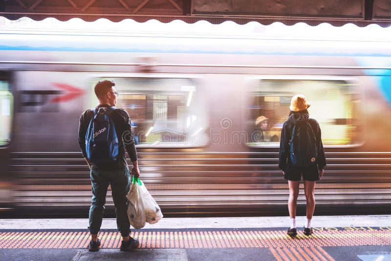 Back of a Man Waiting for the Train Under the Sunlight at Station on 4 ...